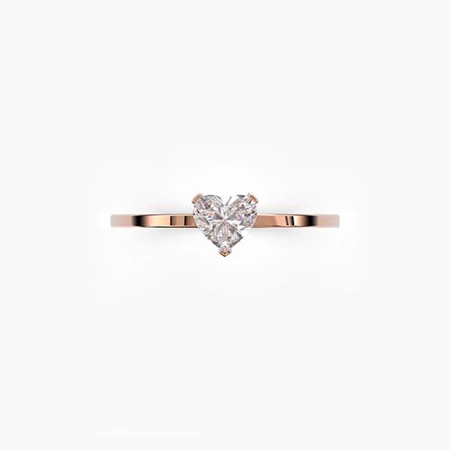 Red gold engagement ring with a heart cut shape diamond